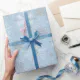 Pretty blue white Christmas snowflakes gift wrap | Zazzle