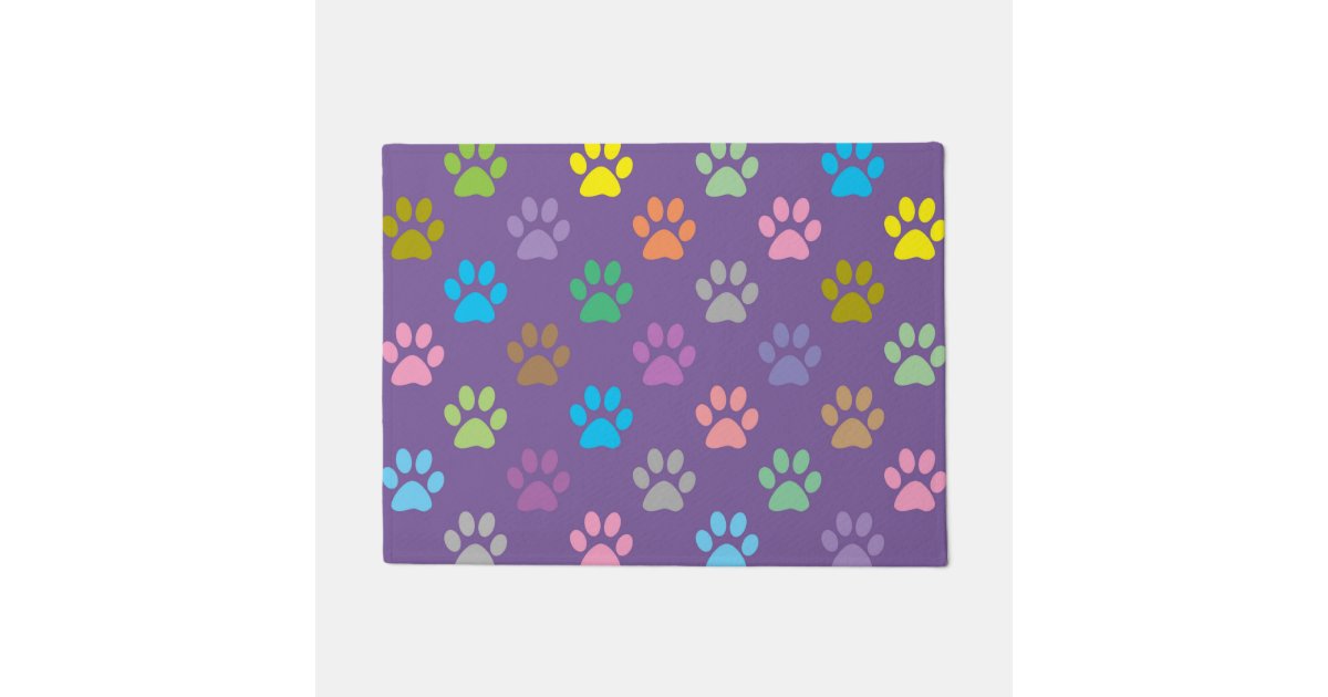 Purple paw prints pattern doormat | Zazzle