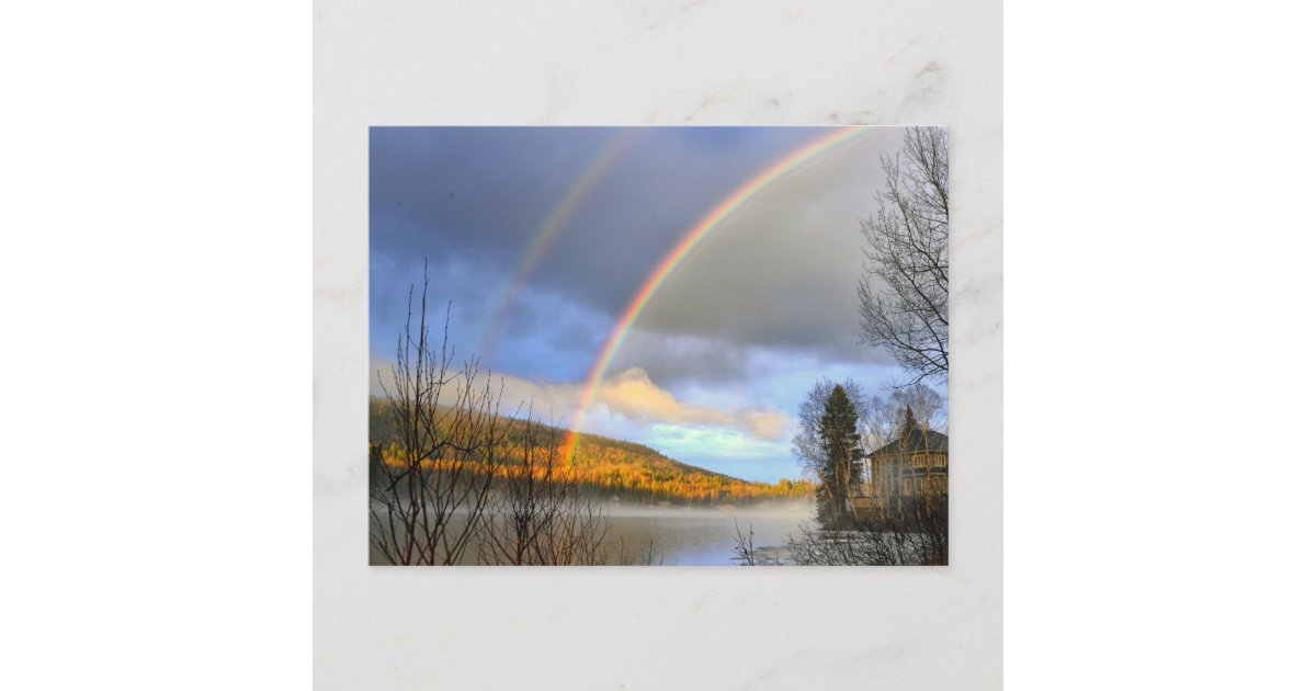 Rainbow over lake and house after storm postcard | Zazzle