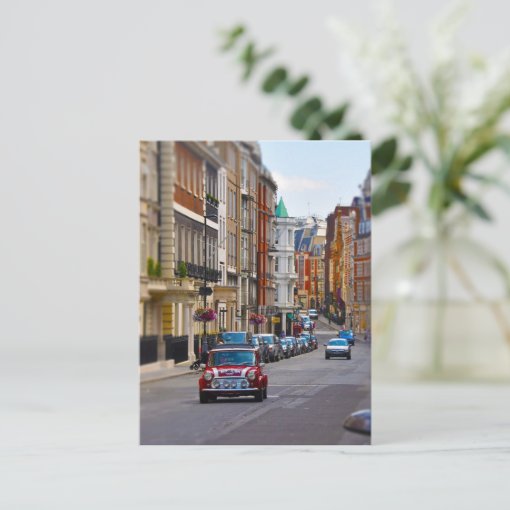Red Mini Cooper car city scene postcard | Zazzle