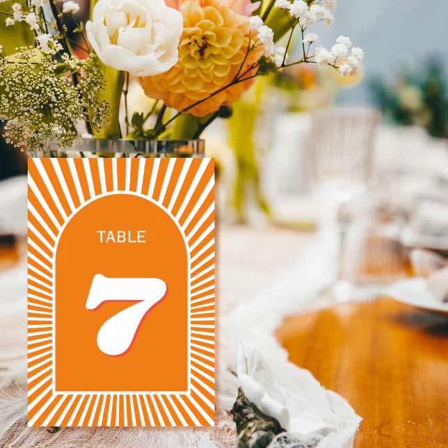 Retro groovy orange sunrays 70s inspired wedding table number | Zazzle