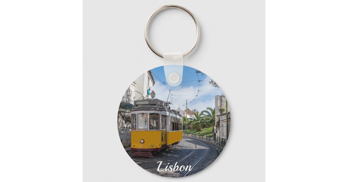 Retro yellow tram on street in Lisbon, Portugal Keychain | Zazzle