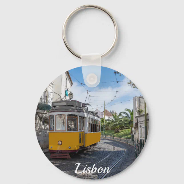 Retro yellow tram on street in Lisbon, Portugal Keychain | Zazzle