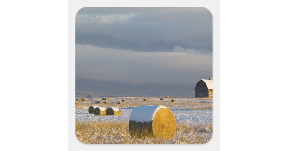 Rustic barn and hay bales after a fresh snow 3 square sticker | Zazzle