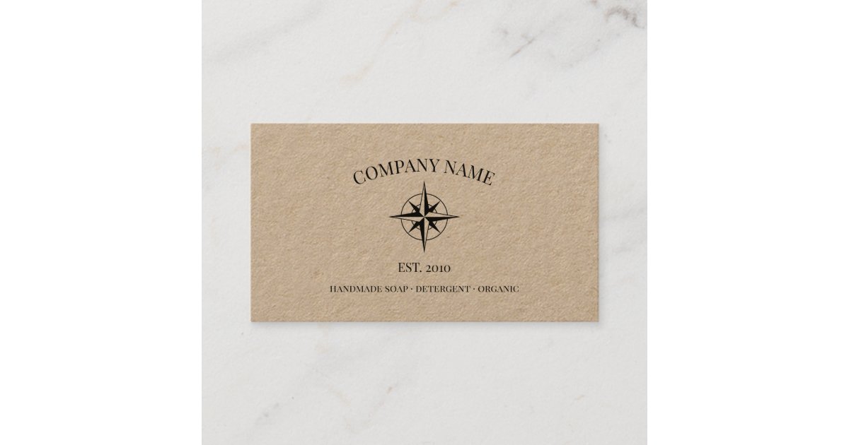 Rustic compass rose logo kraft business card | Zazzle