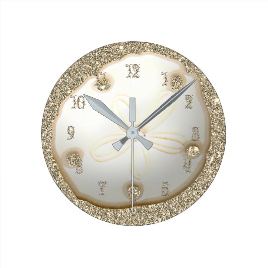 Sand dollar on sparkly gold beach sand round clock | Zazzle.com