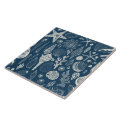 Sea shells on dark blue ceramic tile | Zazzle