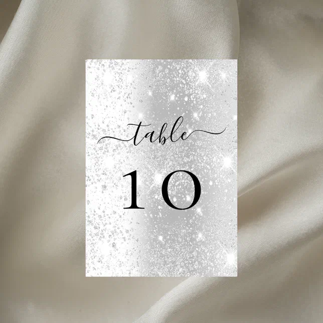 Silver glitter sparkles glamorous table number | Zazzle