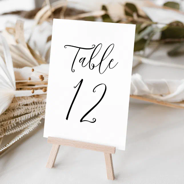 Simple Black Script Wedding Table Number | Zazzle
