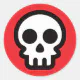 Simple skull logo on red background, round sticker | Zazzle