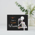 Skeleton Eating Halloween Candy (with Spider) Postcard | Zazzle