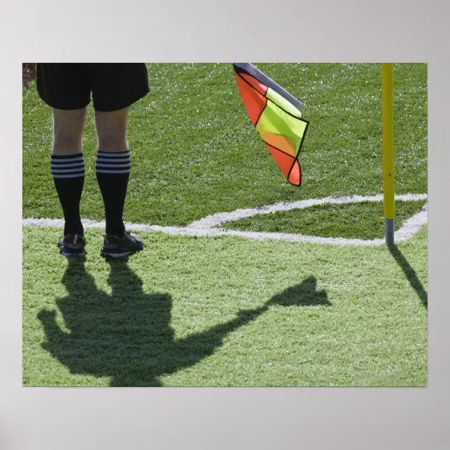 Soccer referee holding flag. poster | Zazzle