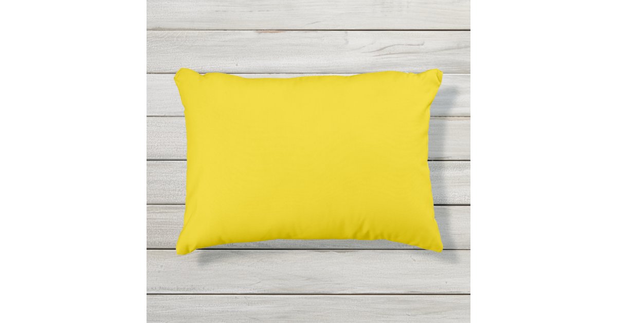Solid bright lightning yellow outdoor pillow | Zazzle