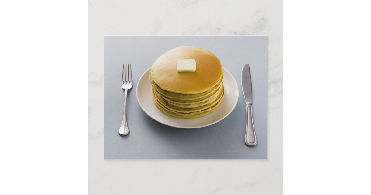 Stack of pancakes with butter on a plate postcard | Zazzle