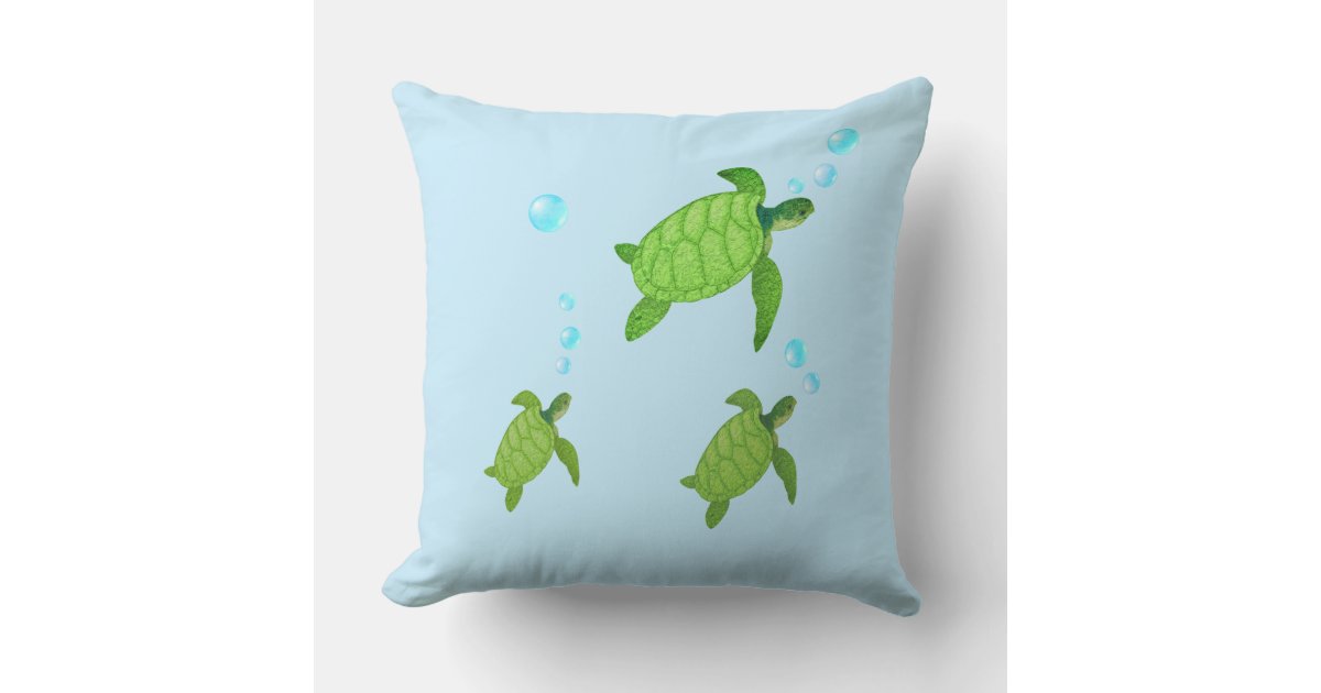 Swimming green sea turtles on turquoise throw pillow | Zazzle