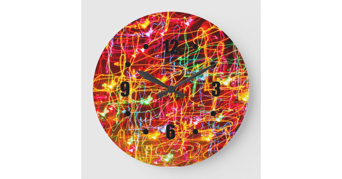 Swirling Neon Lights Glowing Wall Clocks | Zazzle