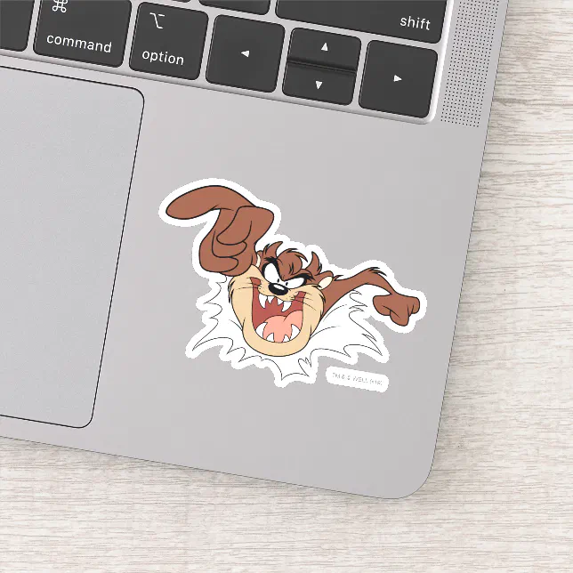 TAZ™ Bursting Through Page Sticker | Zazzle
