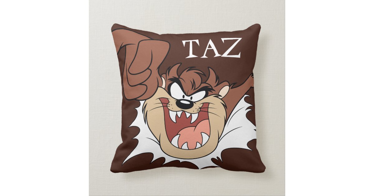TAZ™ Bursting Through Page Throw Pillow | Zazzle.com