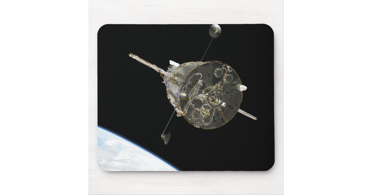 The Hubble Space Telescope in orbit above Earth Mouse Pad | Zazzle