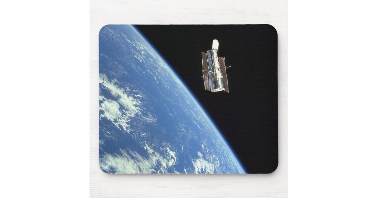 The Hubble Space Telescope with a blue earth Mouse Pad | Zazzle