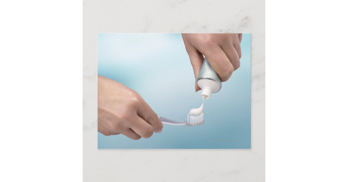 Toothpaste being squeezed onto a brush postcard | Zazzle