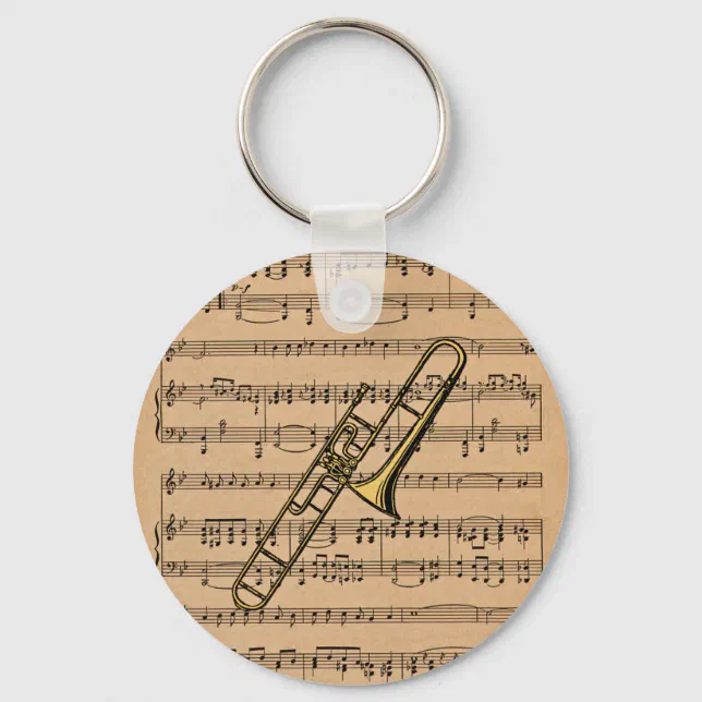 Trombone With Sheet Music Background Keychain | Zazzle