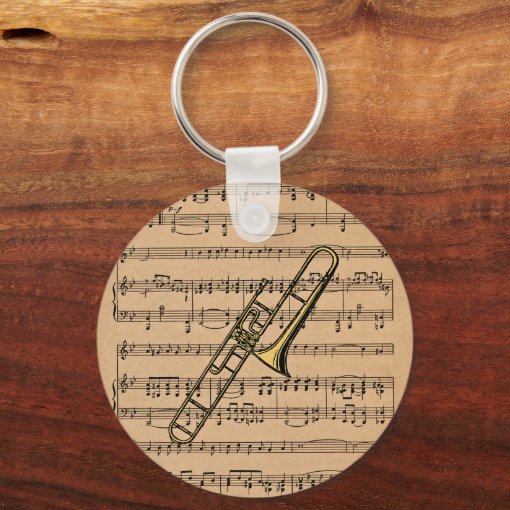 Trombone With Sheet Music Background Keychain | Zazzle