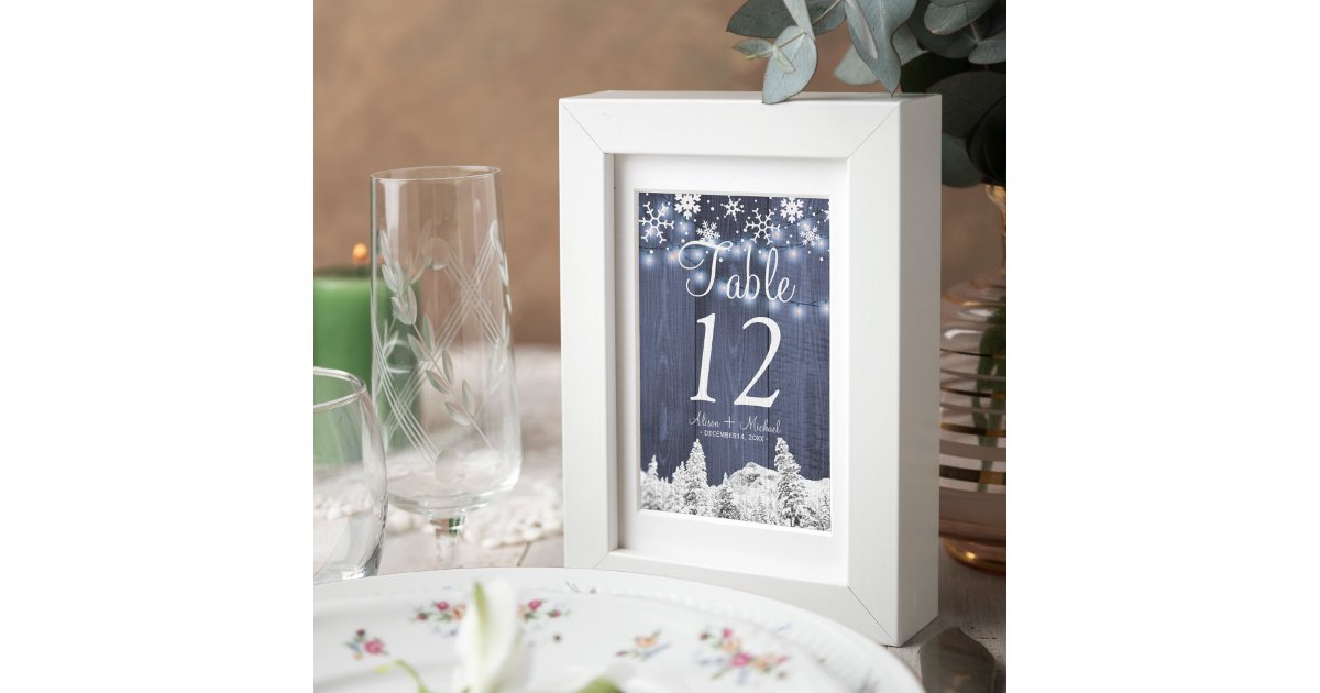 Twinkle lights wonderland snowflakes wedding table number | Zazzle