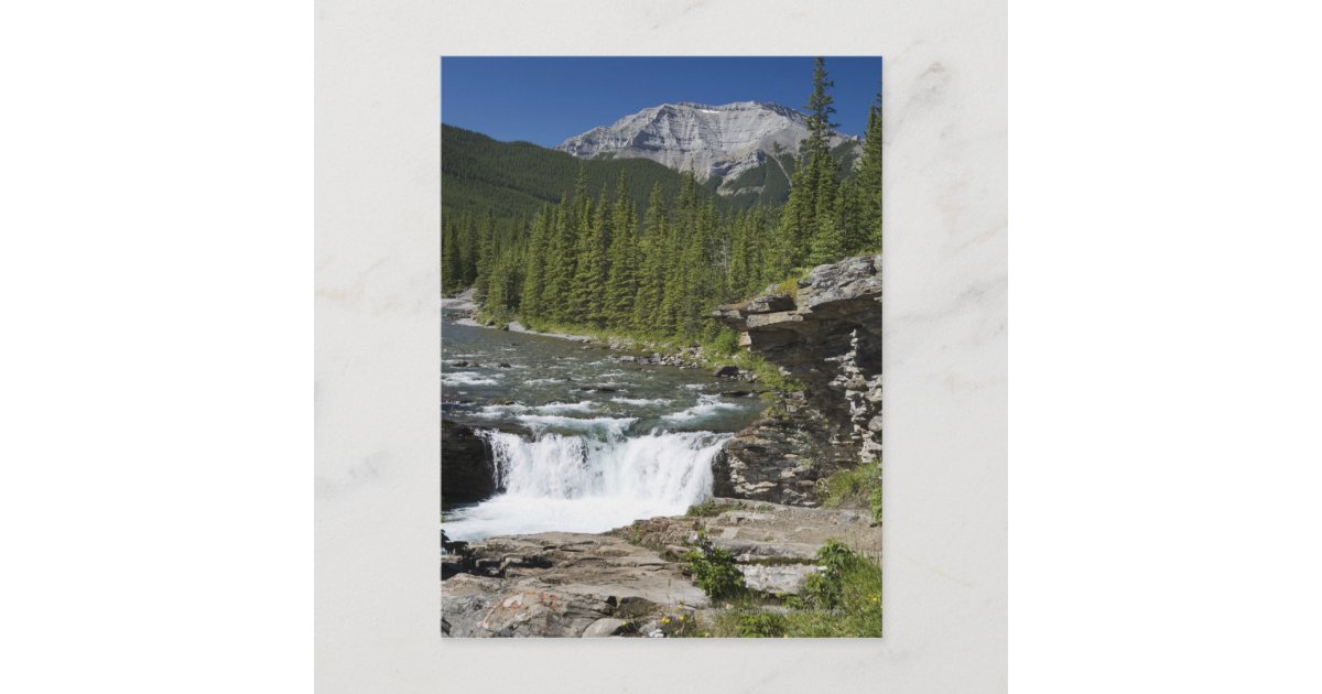 Waterfalls With Rock Ledge And A Mountain Postcard | Zazzle
