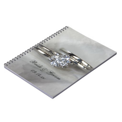 Wedding Rings on Gray Notebook | Zazzle