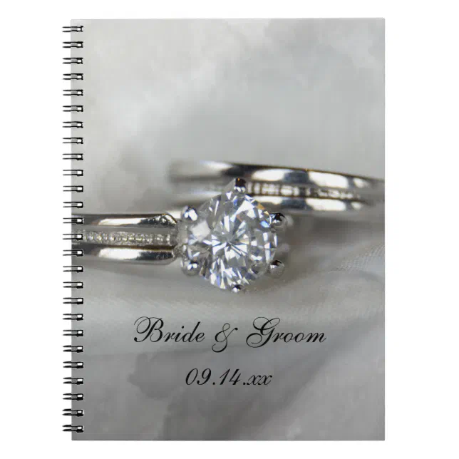 Wedding Rings on Gray Notebook | Zazzle