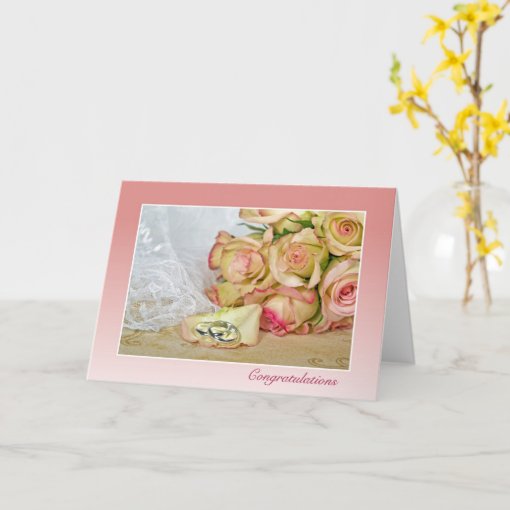 wedding rings on rose petal card | Zazzle