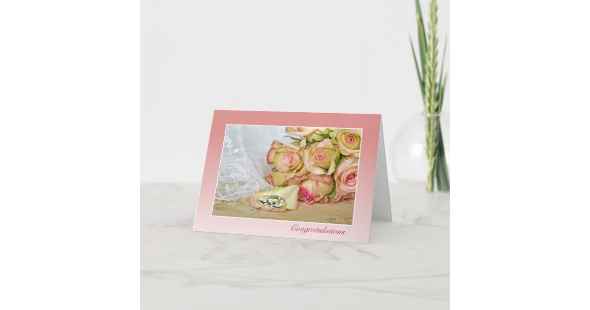 wedding rings on rose petal card | Zazzle