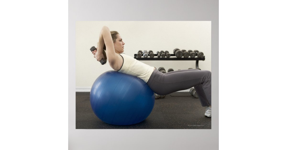 Woman using exercise ball and hand weights poster | Zazzle