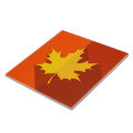 Yellow Maple Leaf on Orange Ceramic Tile | Zazzle